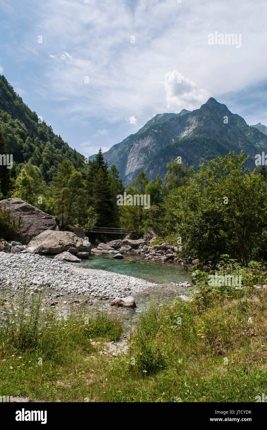 Creek and rocks of the Mello Valley, Val di Mello, green valley ...