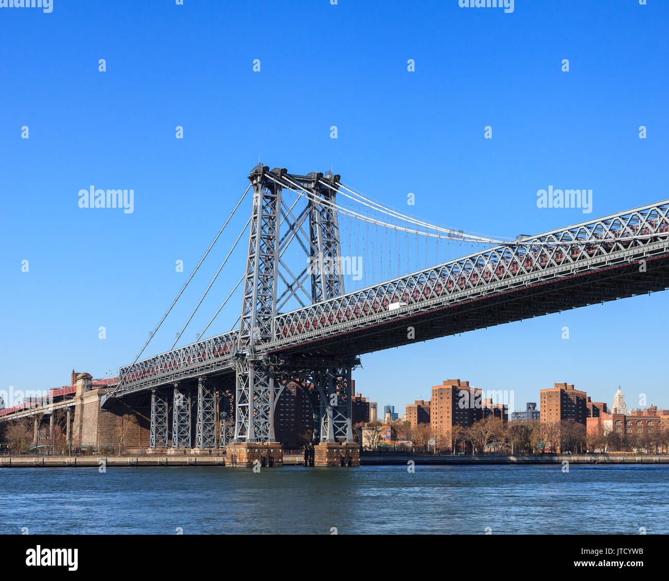 Williamsburg Bridge. A view of Williamsburg Bridge in New York City. The bridge spans the East ...