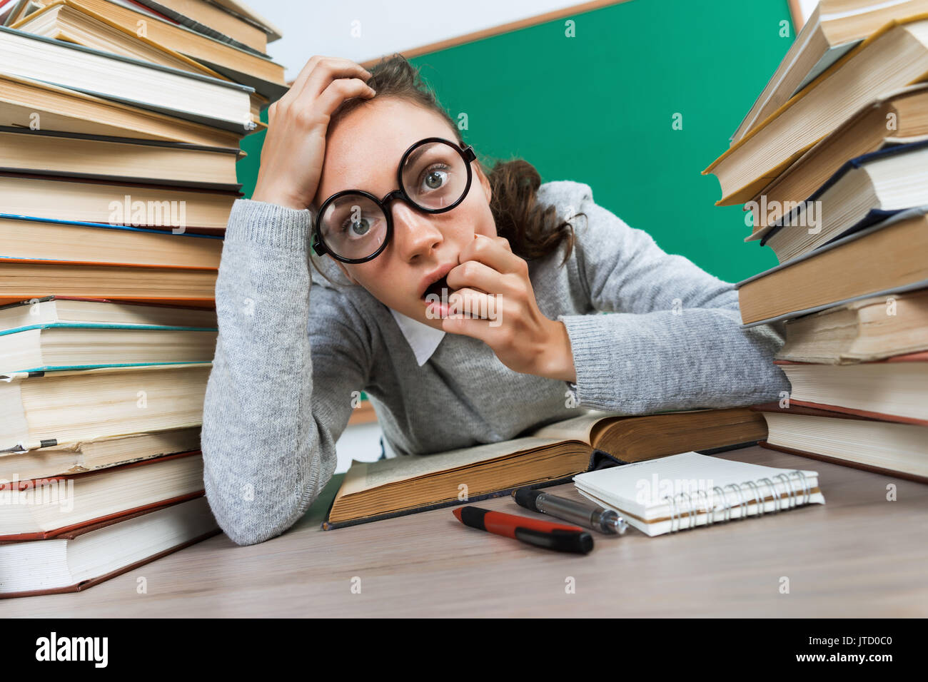Student in shock. Photo of young girl with open mouth and big eyes ...