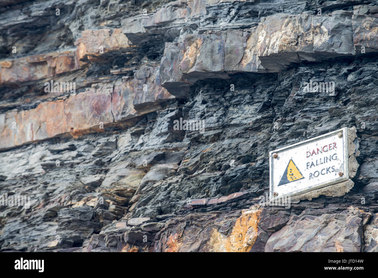 Warning sign advising of falling rocks. Cornwall, England, United ...