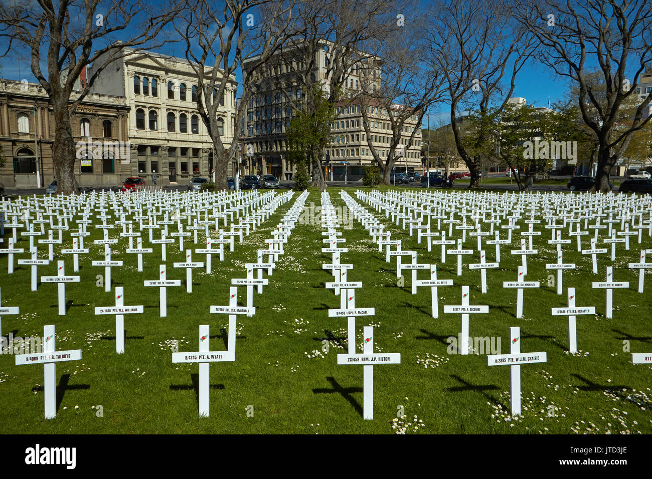 Soldiers crosses at WWI Field of Remembrance and historic buildings ...