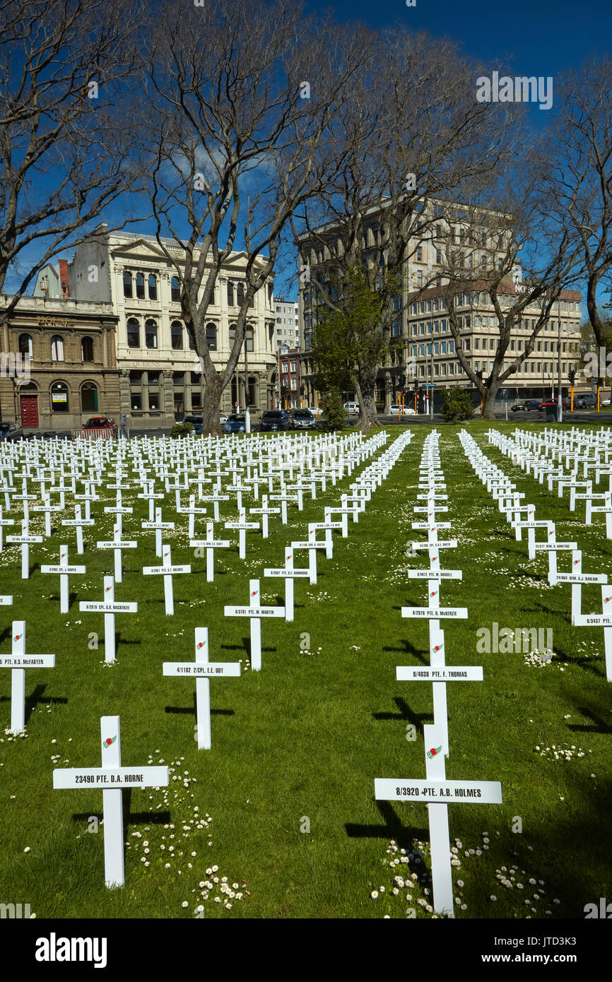 Soldiers crosses at WWI Field of Remembrance and historic buildings ...