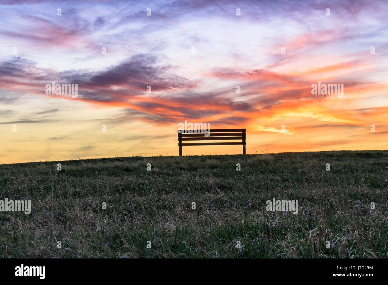 Lonely bench sunset hi-res stock photography and images - Alamy