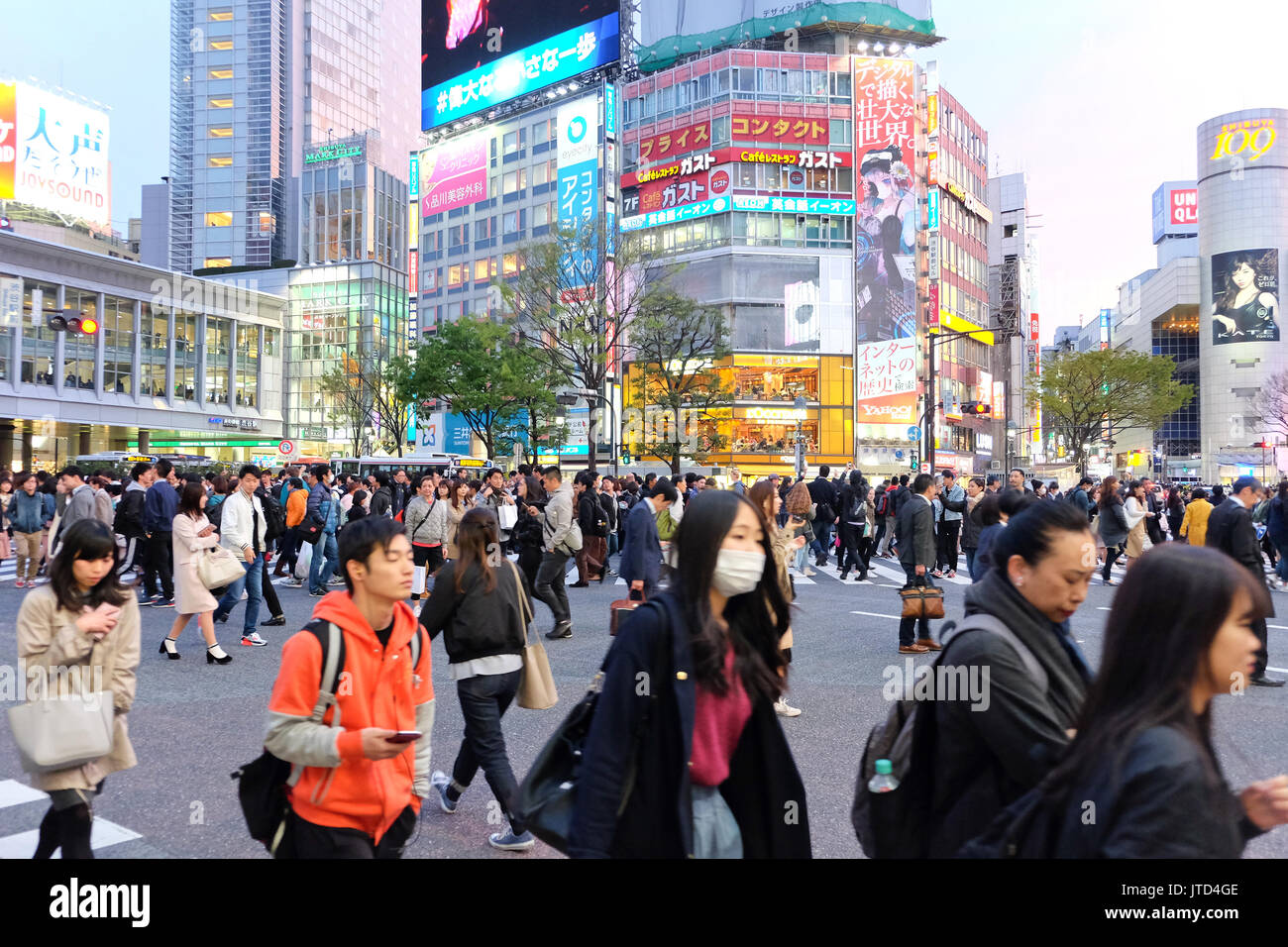 TOKYO - APRIL 10: Crowds of people crossing the center of Shibuya on ...