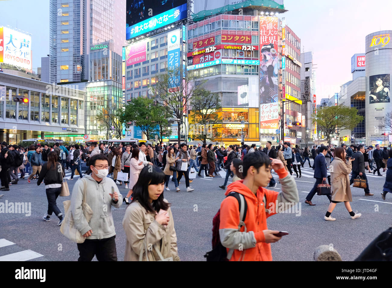 TOKYO - APRIL 10: Crowds of people crossing the center of Shibuya on ...
