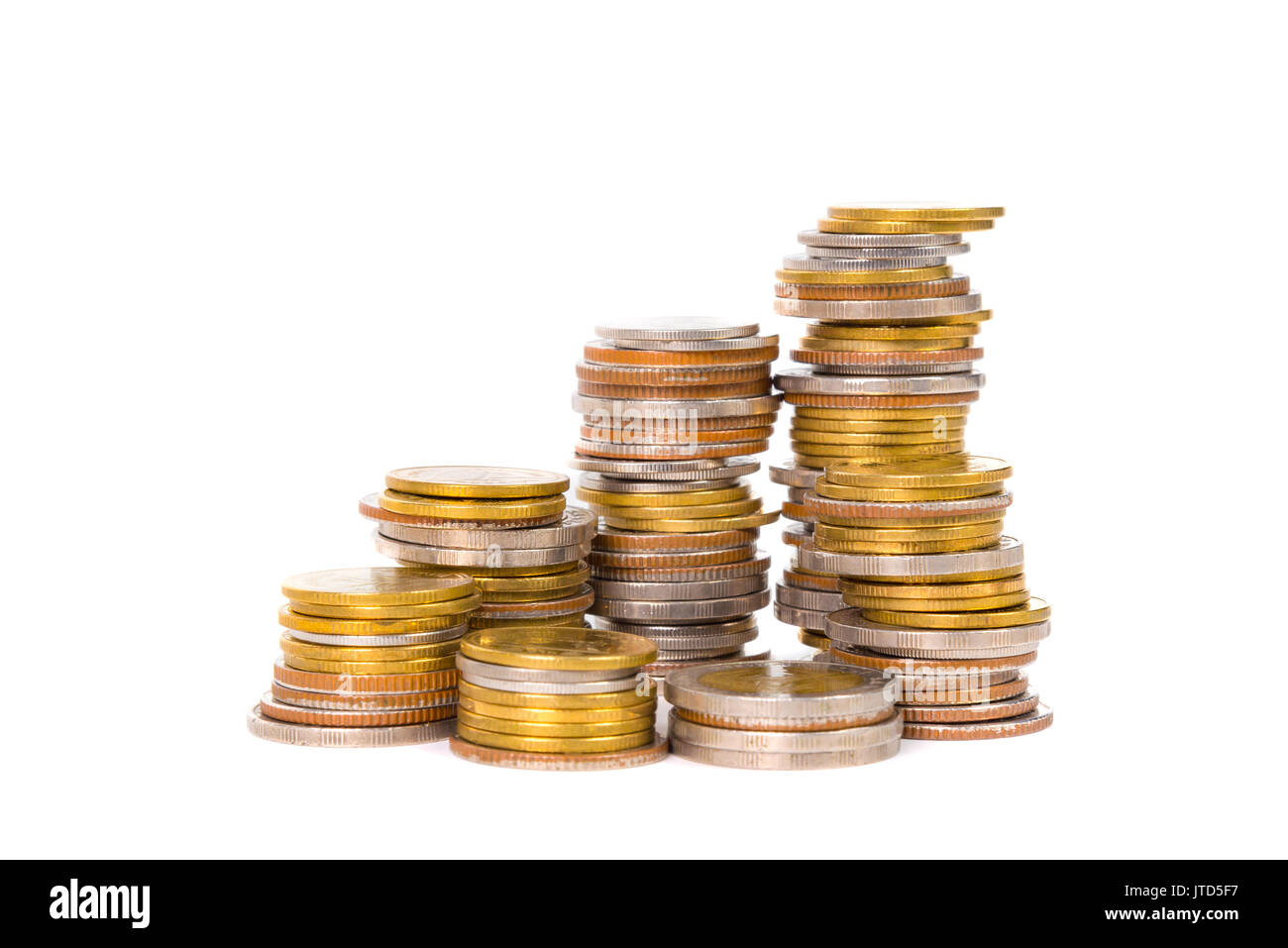 Columns of coins, piles of coins arranged on white background, business ...