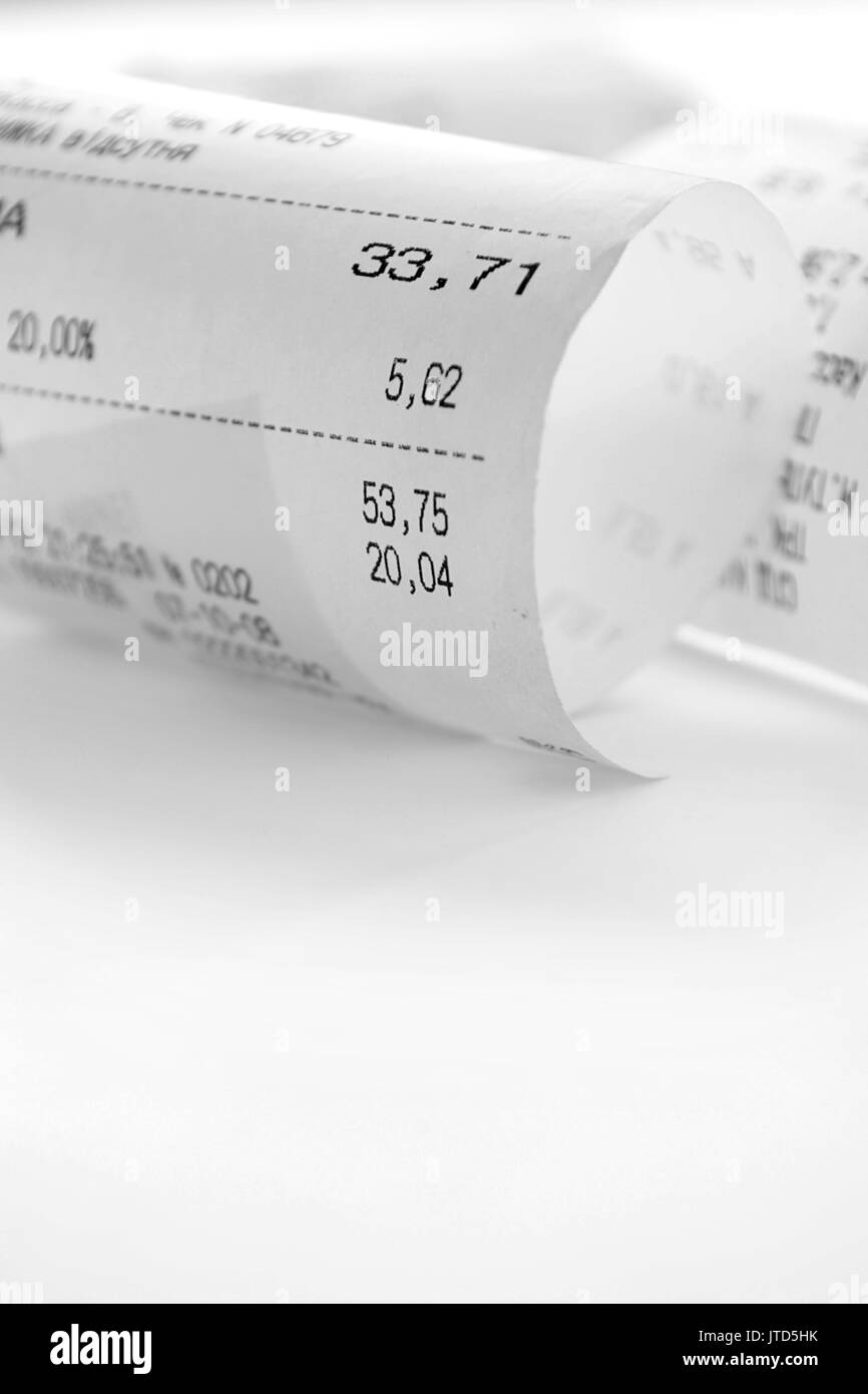 receipt paper a description of purchases on a white background and copy ...