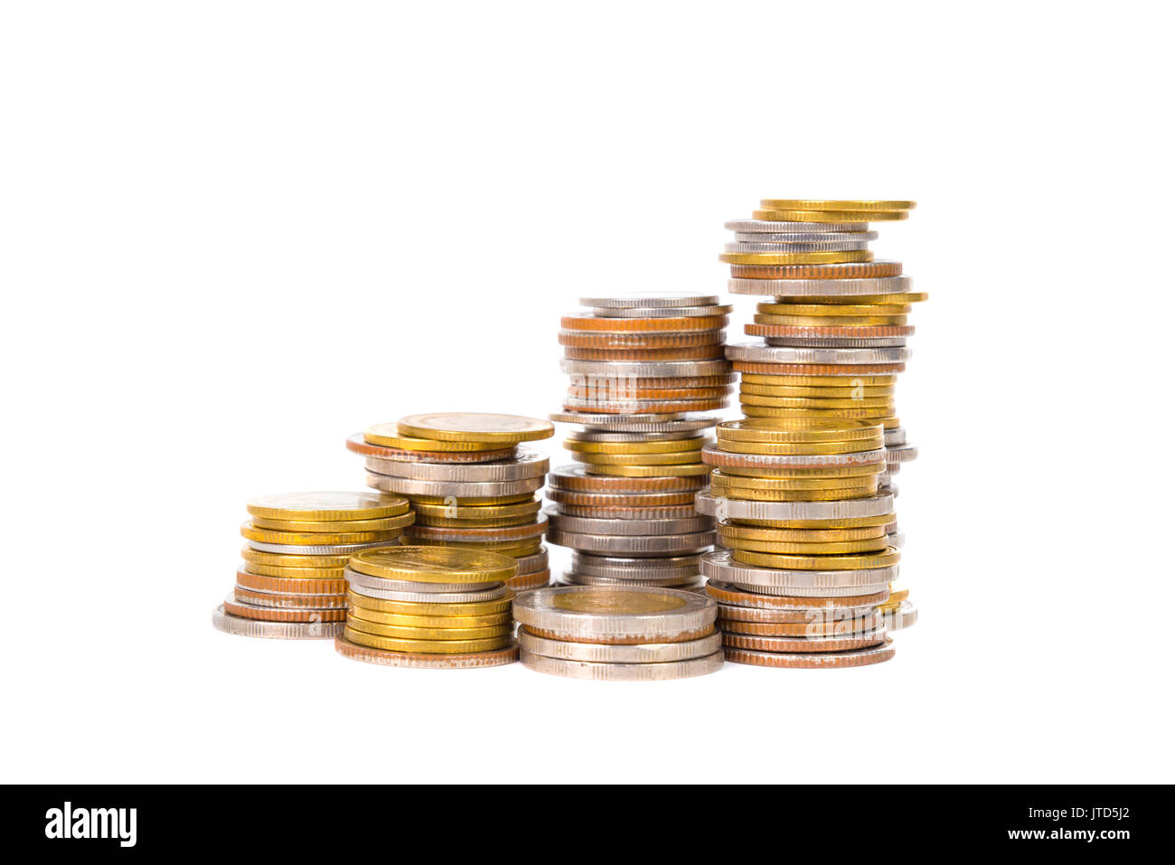 Columns of coins, piles of coins arranged on white background, business ...