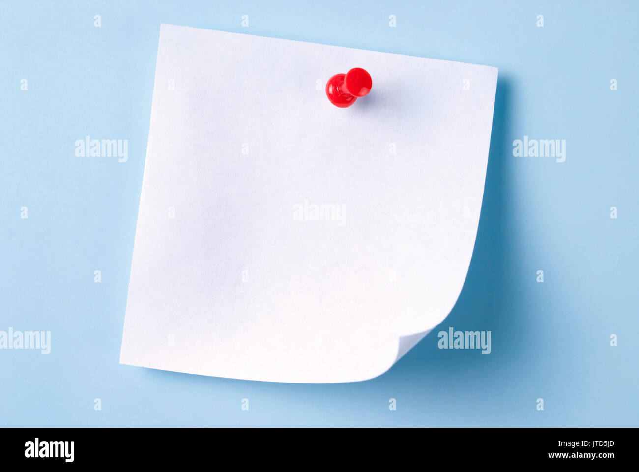paper for important reminders on a blue background Stock Photo - Alamy