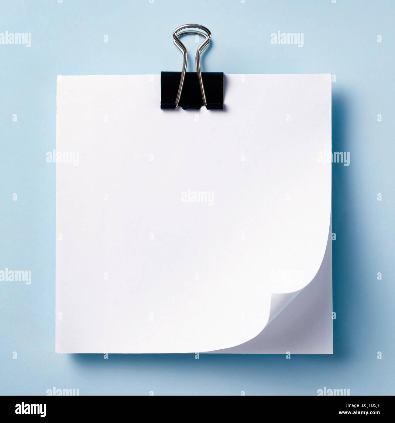 paper for important reminders on a blue background Stock Photo - Alamy
