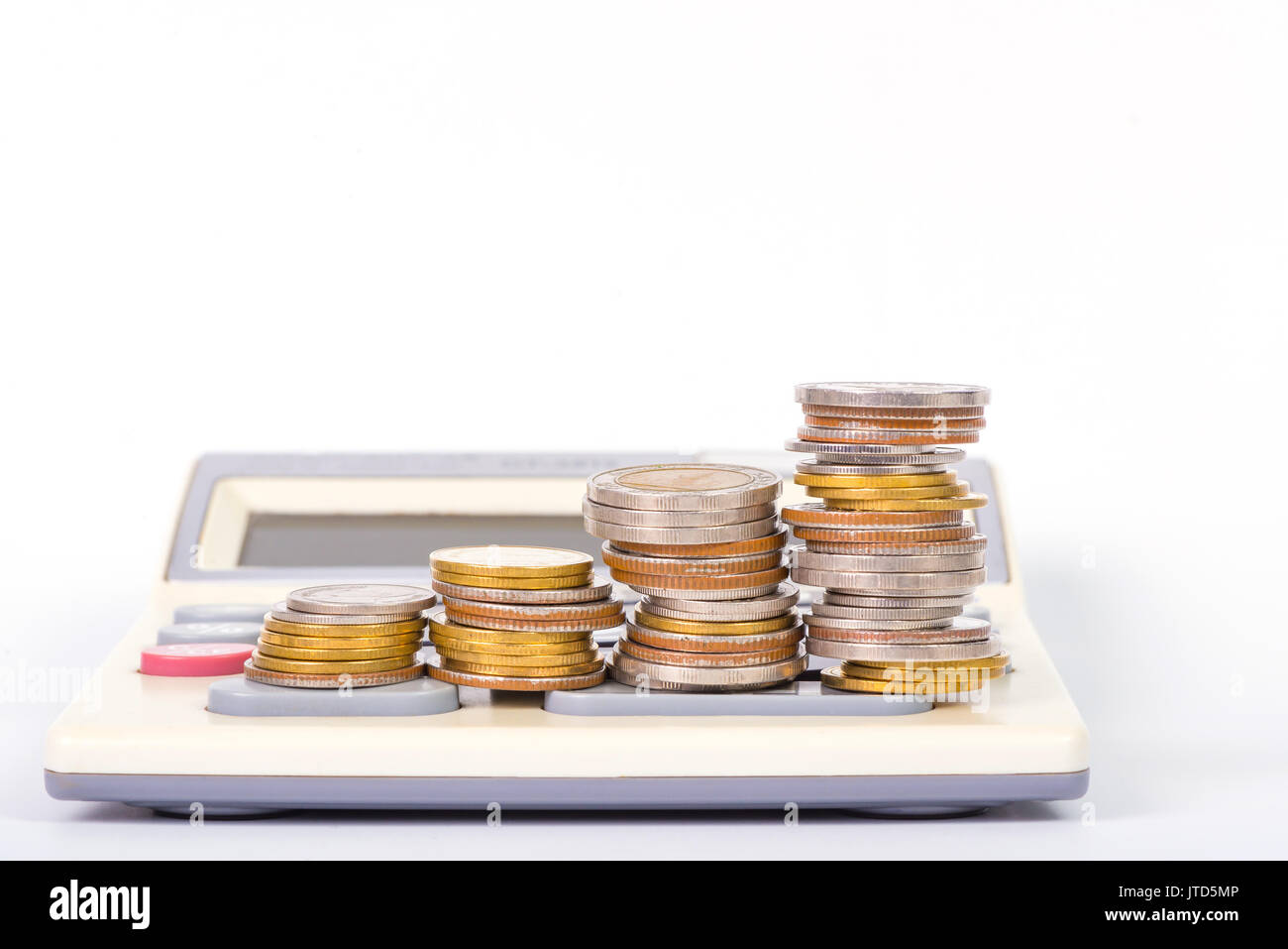 Savings, increasing columns of coins, piles of coins arranged as a ...