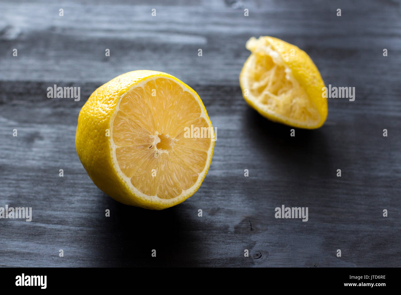Lemon cut in half hi-res stock photography and images - Alamy