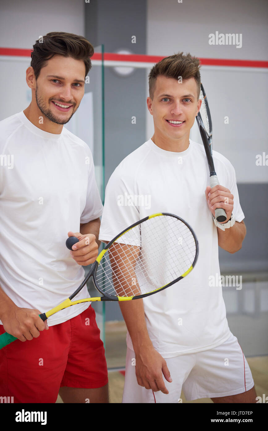 Portrait of two best friends while playing squash Stock Photo - Alamy