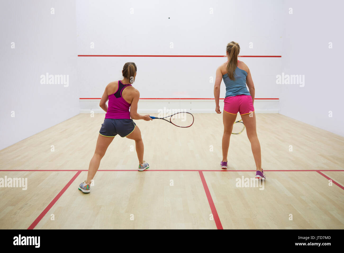 Women on the move at the squash court Stock Photo - Alamy