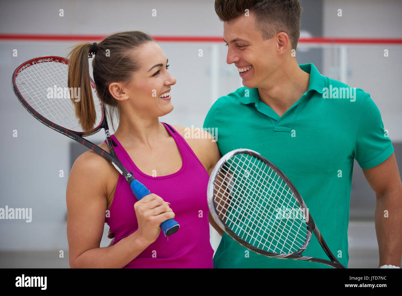 Playing in squash make us happy Stock Photo - Alamy