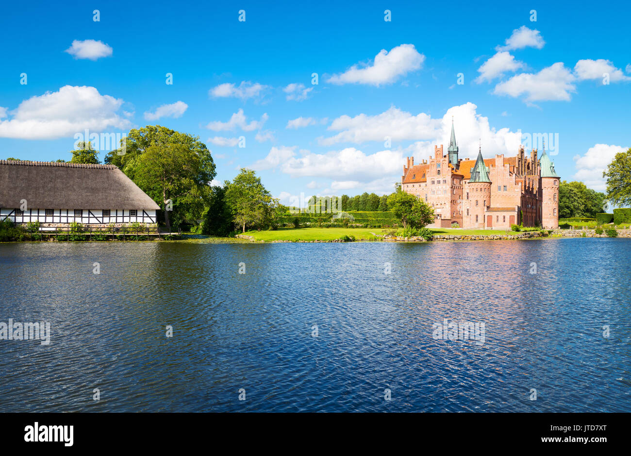 Panoramic view of the egeskov castle on the lake hi-res stock ...