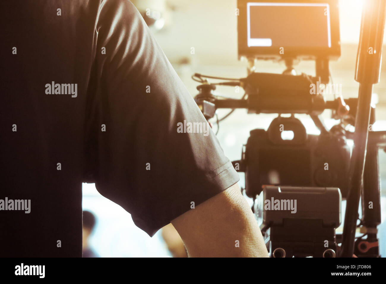 Cameraman with his video camera shooting, Adjusting Camera,film ...