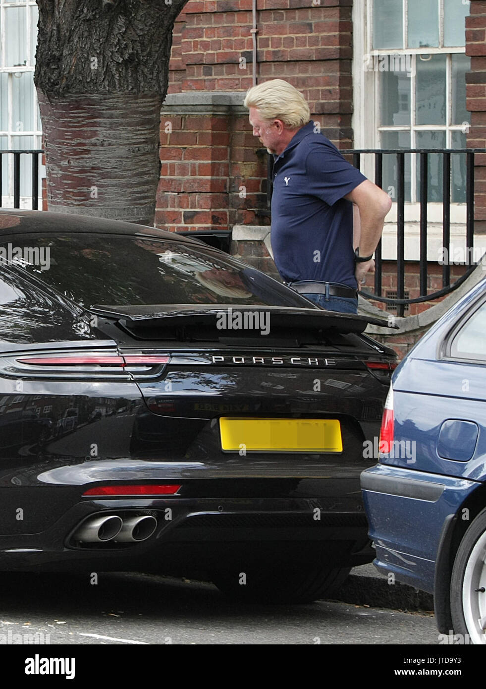 Well dressed Boris Becker and Lilly Becker take their son Amadeus on a ...