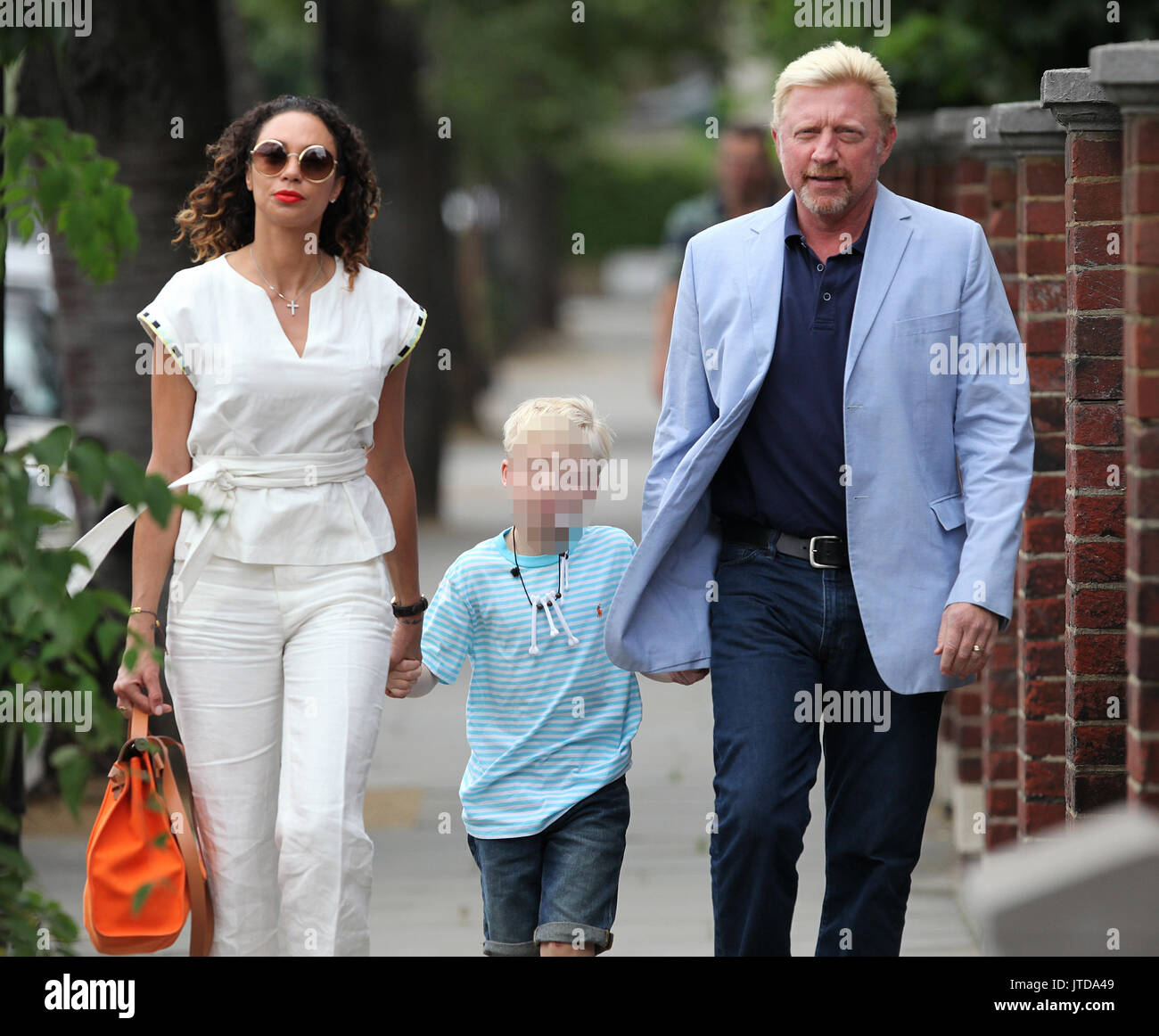 Well dressed Boris Becker and Lilly Becker take their son Amadeus on a ...