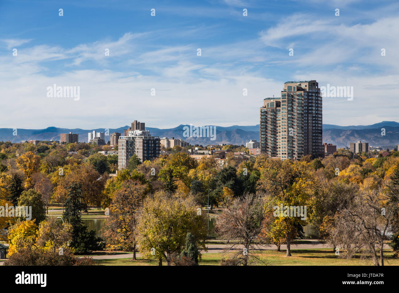 Denver skyline across city park in autumn Stock Photo - Alamy