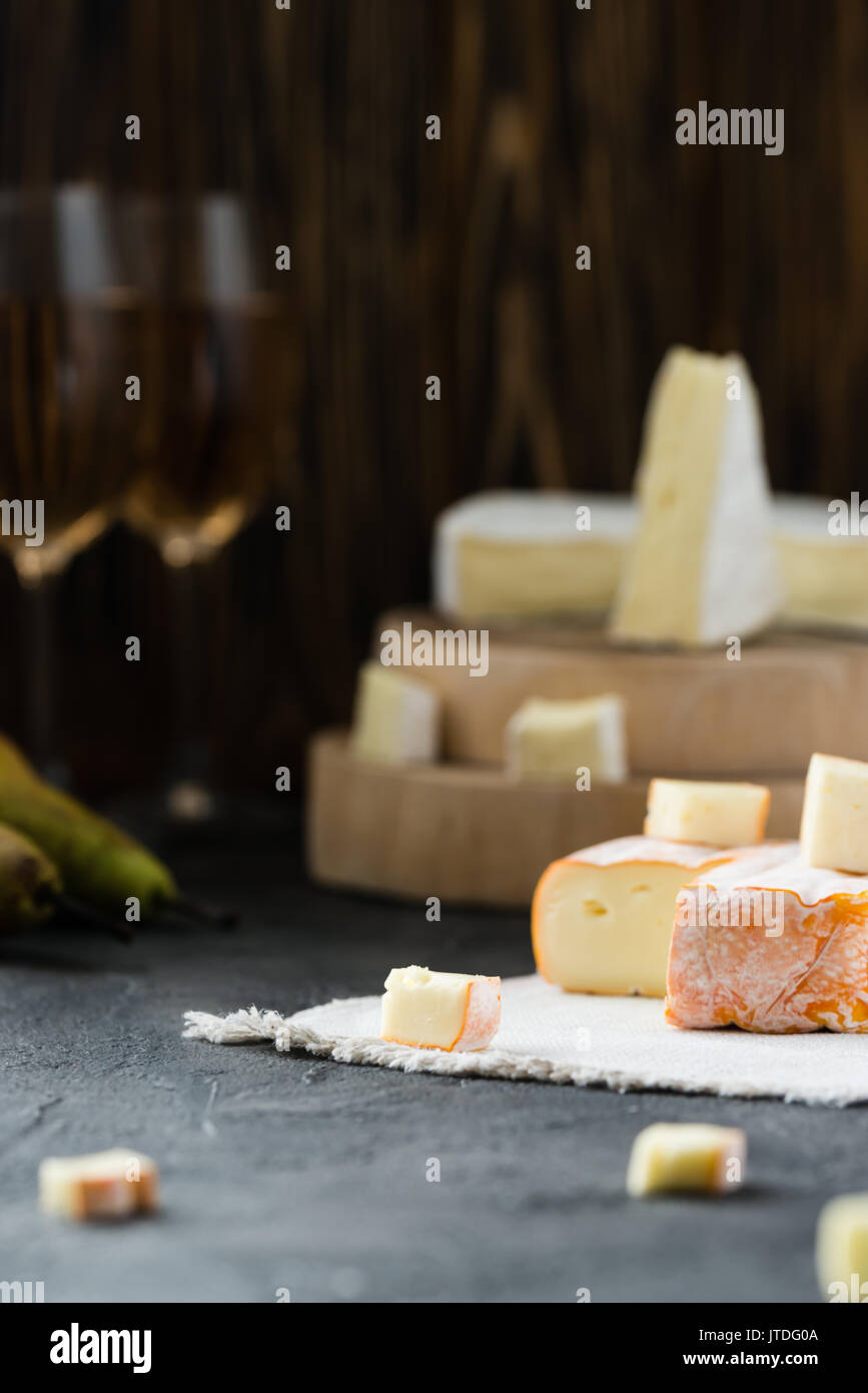 French soft cheese from Brittany region and brie sliced, with pear ...