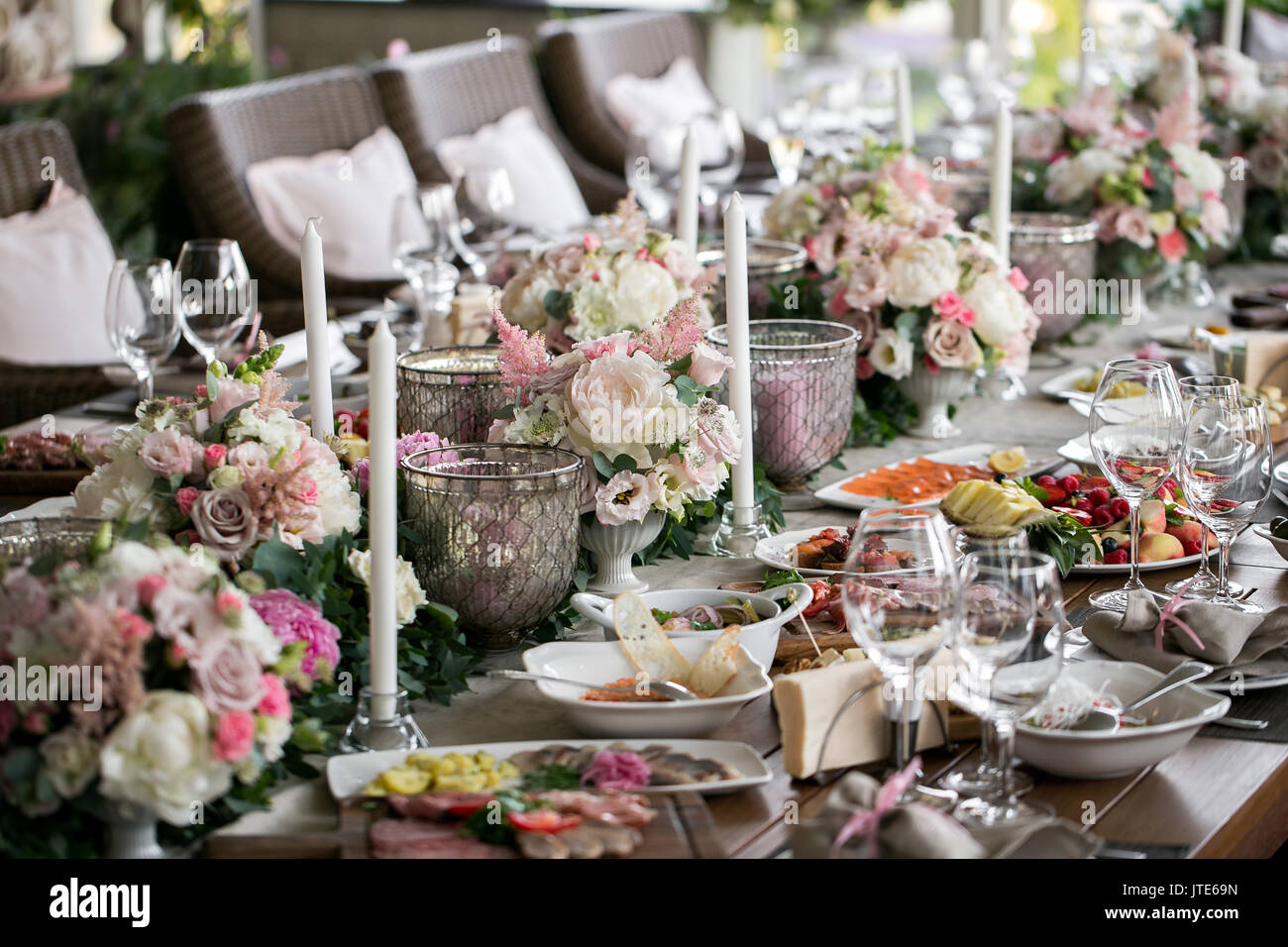 linen textile. Decorated table, a plate of neatly arranged napkin, fork ...