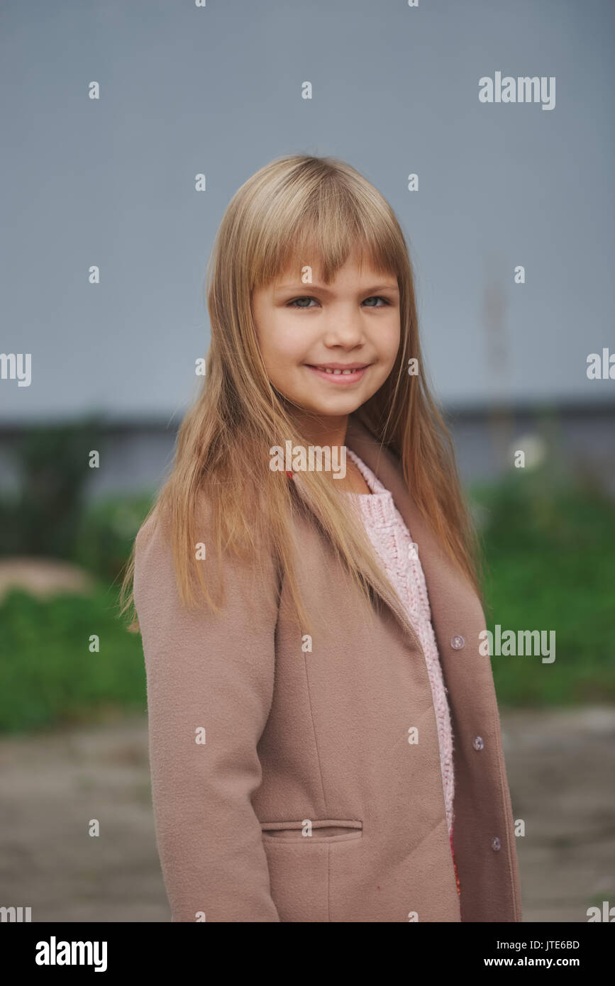 photo of beautiful young girl posing on the street Stock Photo - Alamy