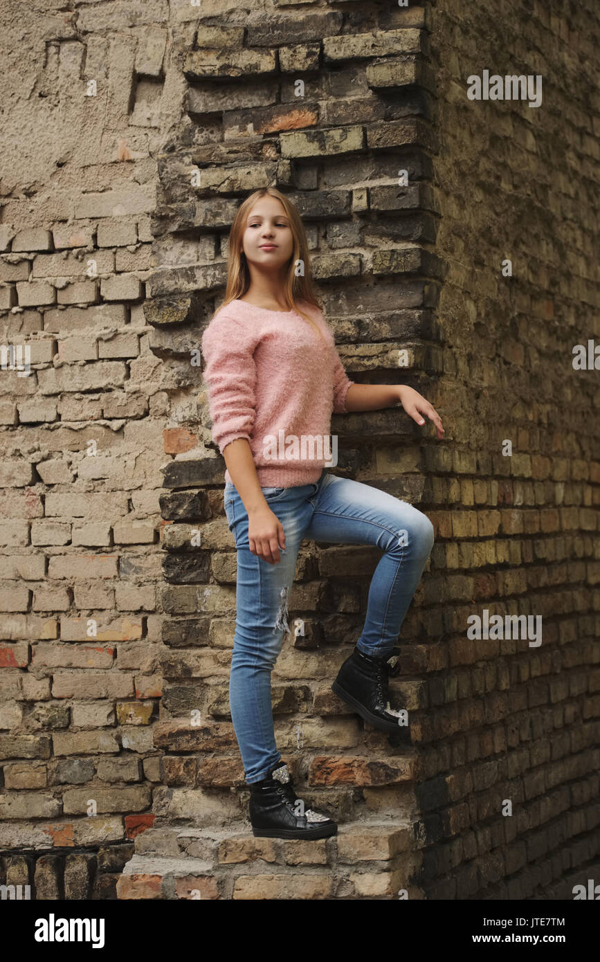 photo of beautiful young girl posing on the street Stock Photo - Alamy