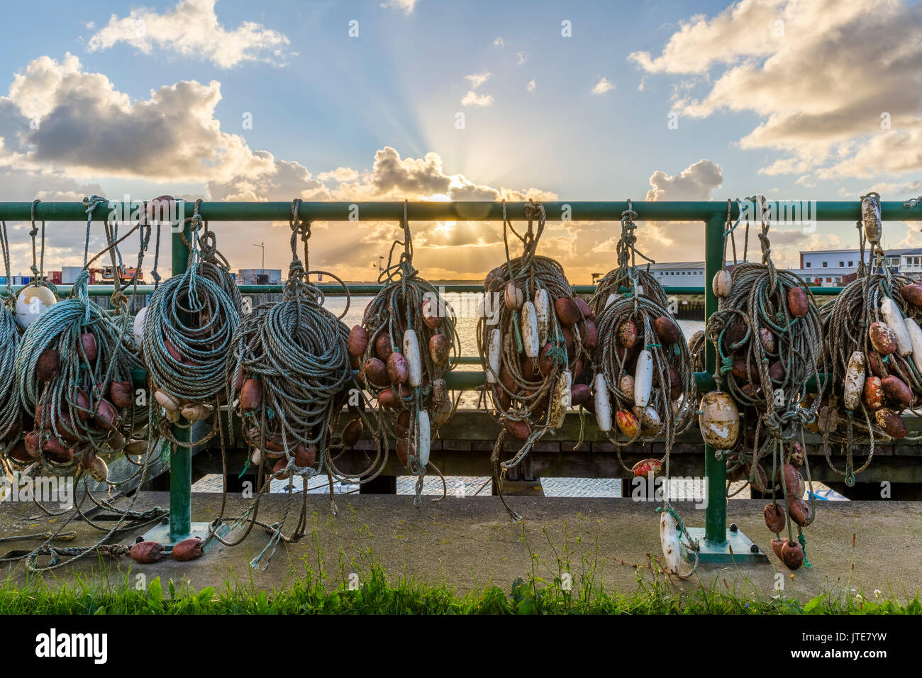 Fishing nets hang on the fence on the island of Helgoland Stock Photo ...