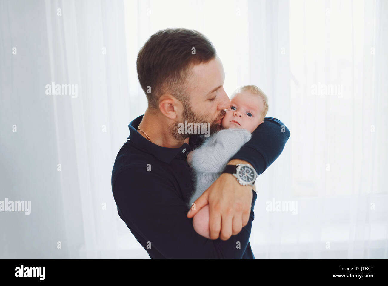 young happy father with cute baby Stock Photo - Alamy