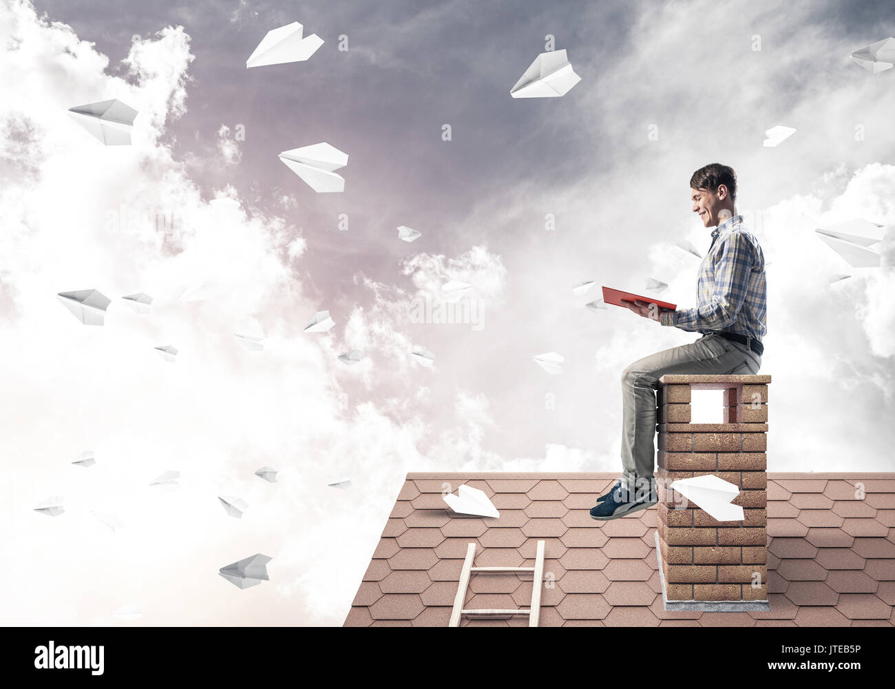 Handsome student guy reading book and paper planes flying in air Stock ...