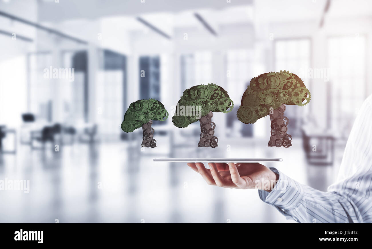 Eco green environment concept presented by tree as working mecha Stock ...