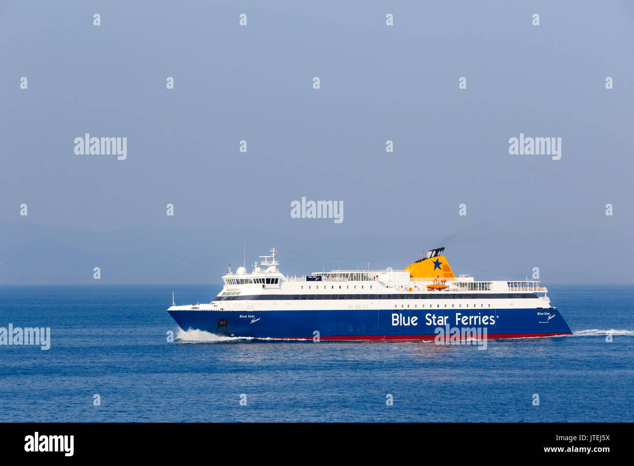 Blue Star ferry boat, cruising at calm sea against a blue sky Stock ...