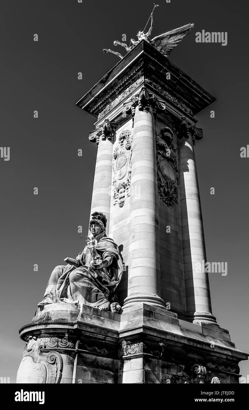 Impressive statues on Alexandre III Bridge in Paris Stock Photo - Alamy