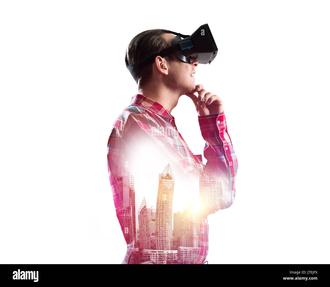 Guy wearing checked shirt and virtual mask with hand on chin Stock ...