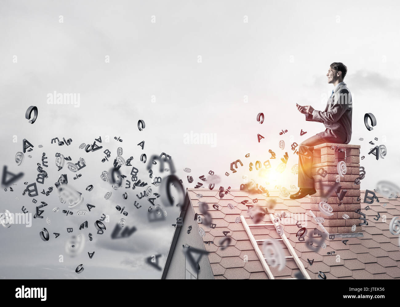 Man on brick roof working with smartphone and symbols flying aro Stock ...