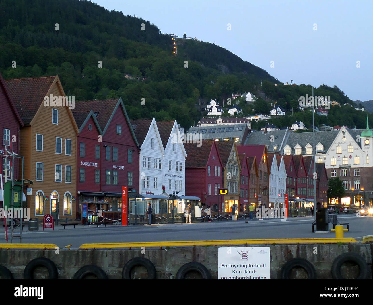 Bryggen, the historic harbor district of Bergen in the summer evening ...