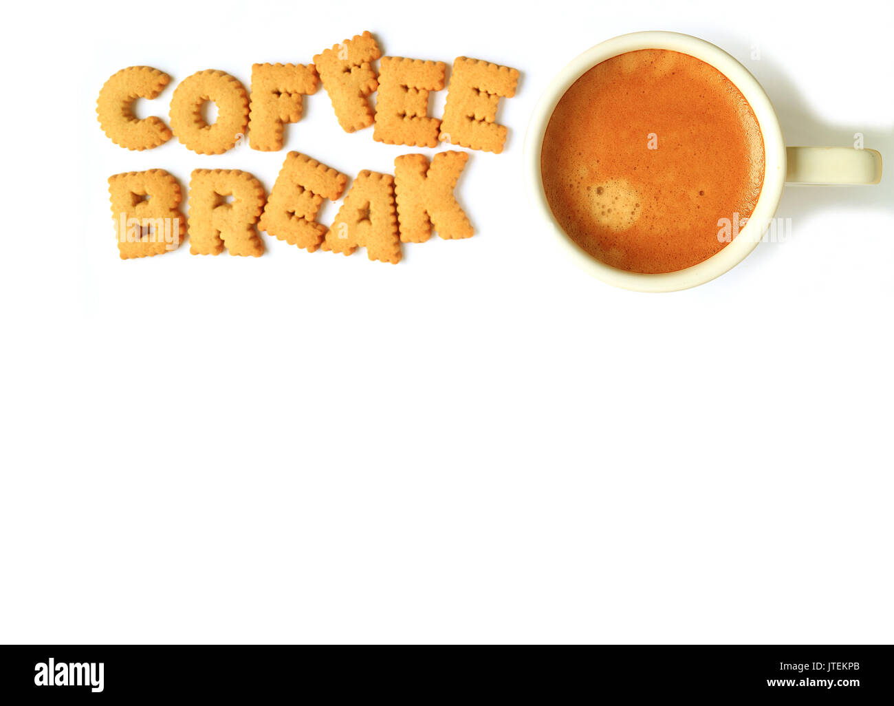 Top view of alphabet shaped biscuits, spelling the word COFFEE BREAK ...