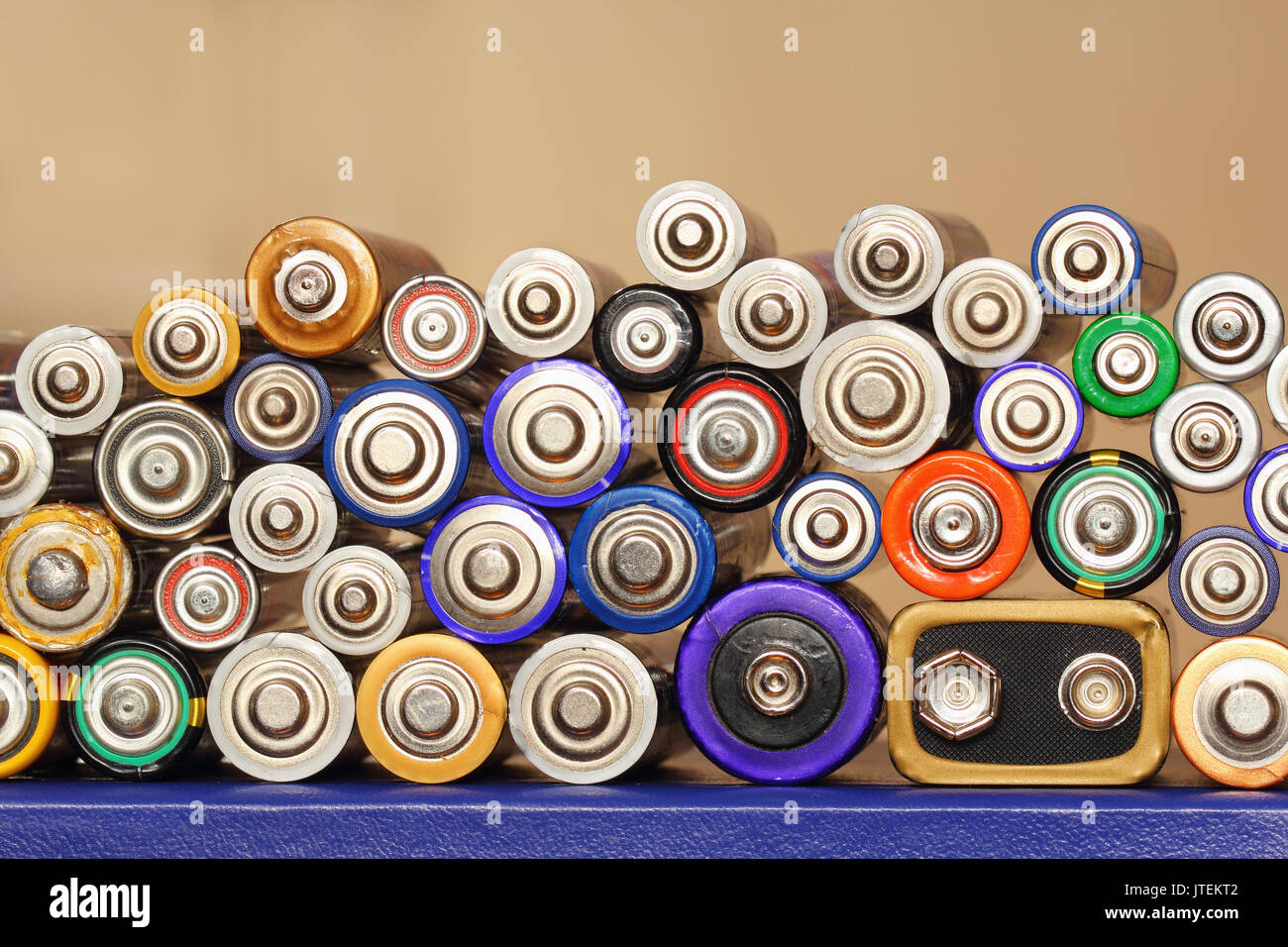 Different types of batteries arranged in a stack Stock Photo - Alamy