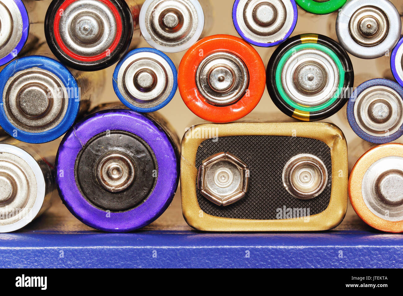 Different types of batteries arranged in a stack Stock Photo - Alamy