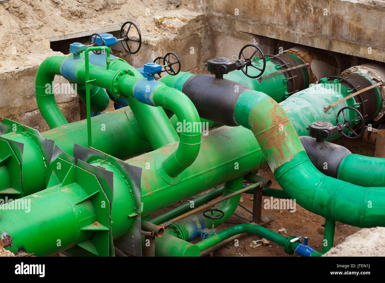Planned repairs of municipal tubing. A node with valves Stock Photo - Alamy