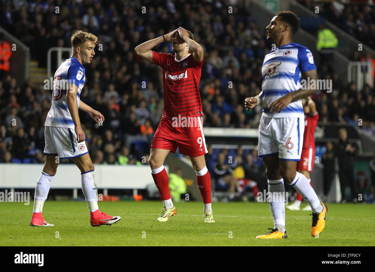 Gillingham's Tom Eaves (centre) rues a missed chance during the Carabao ...
