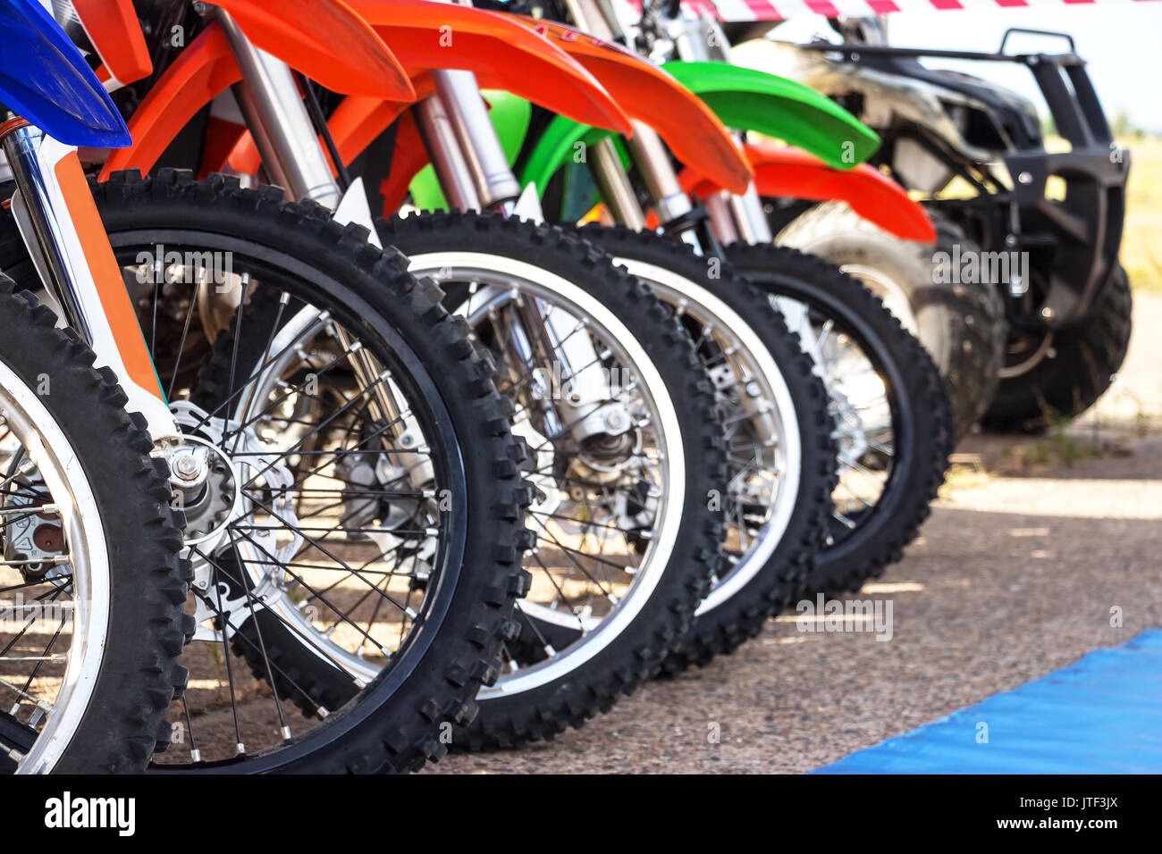 Motocross bike in row Stock Photo - Alamy