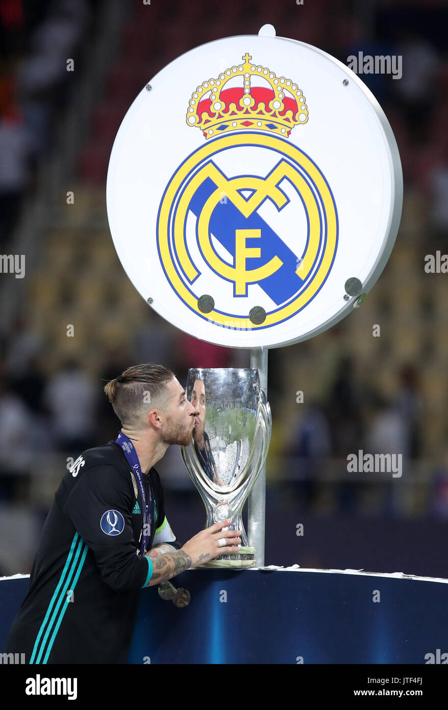 Real Madrid's Sergio Ramos poses with the UEFA Super Cup Trophy during ...