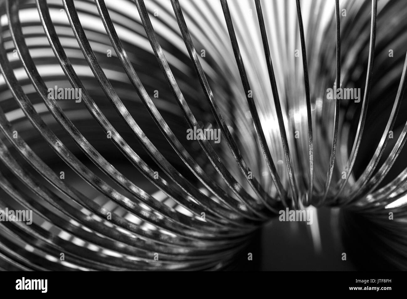 Slinky Black and White Stock Photos & Images - Alamy