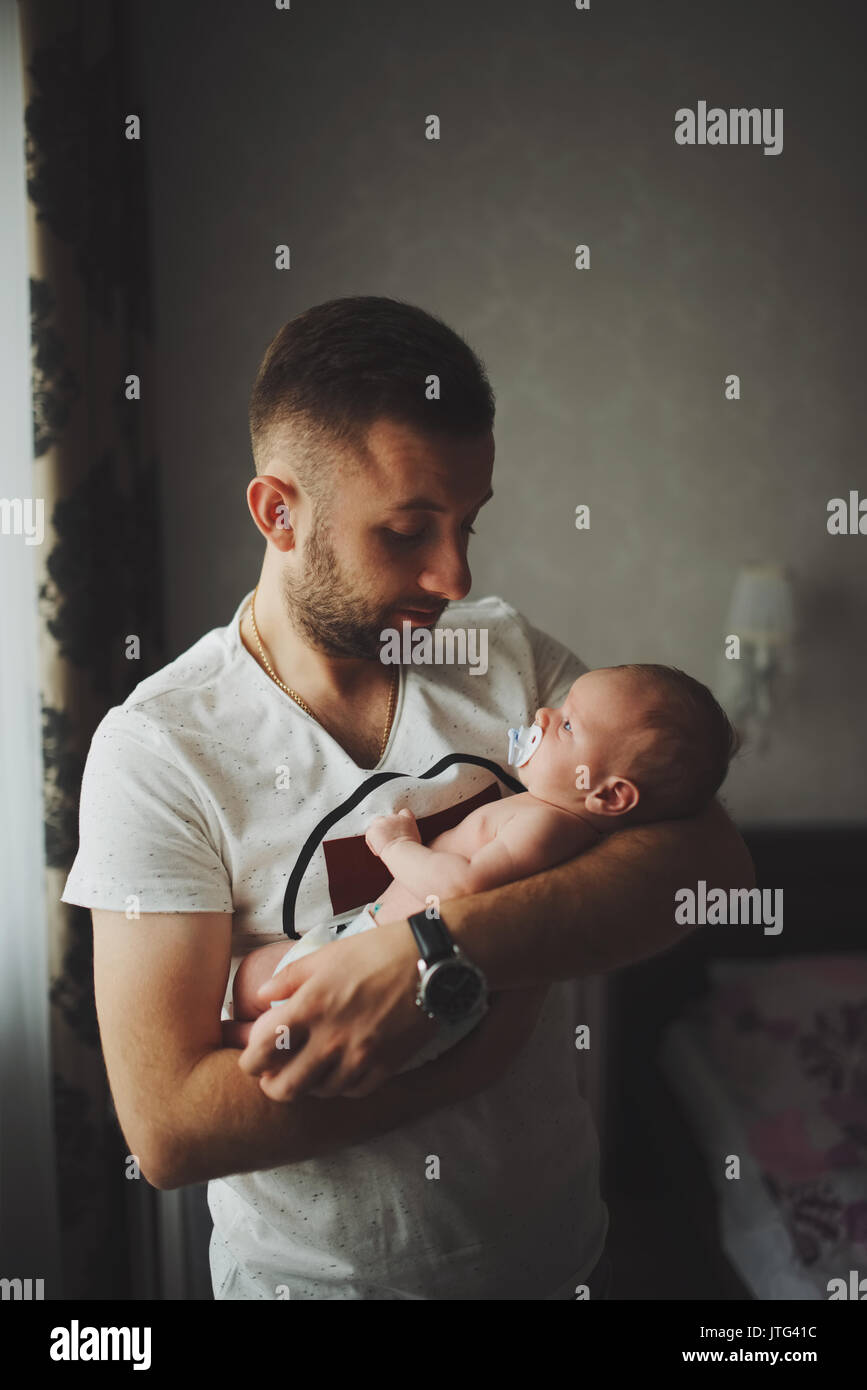 young happy father with cute baby Stock Photo - Alamy