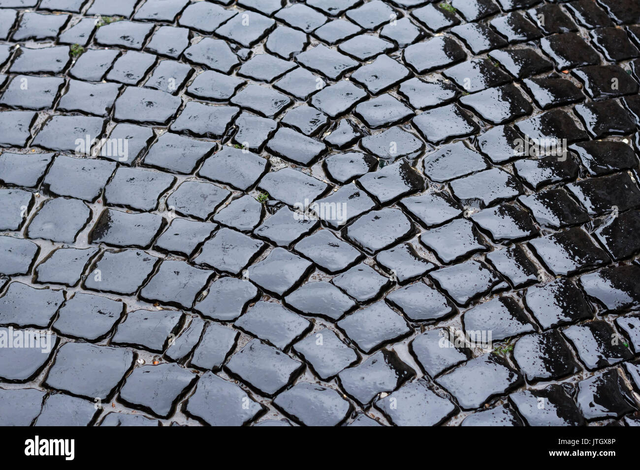 Rain soaked pavement hi-res stock photography and images - Alamy