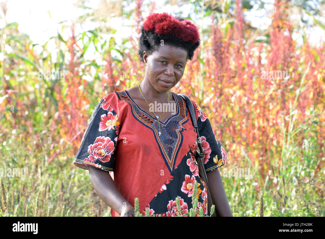 Chia farmer Elizabeth Natocha in a field on her farm in Namayingo ...