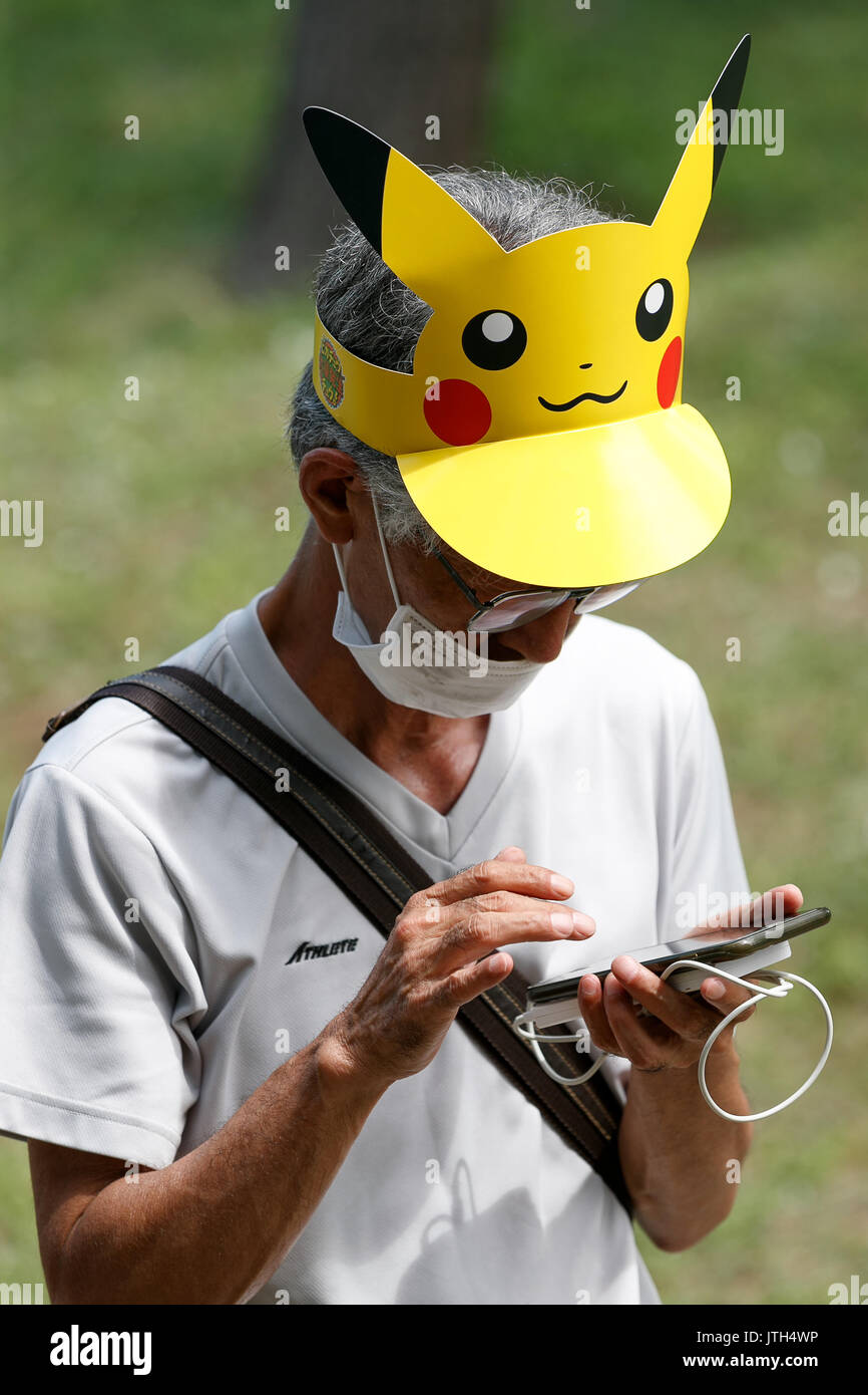 Yokohama, Japan. 9th August, 2017. A man plays ''Pokemon Go'' on his ...