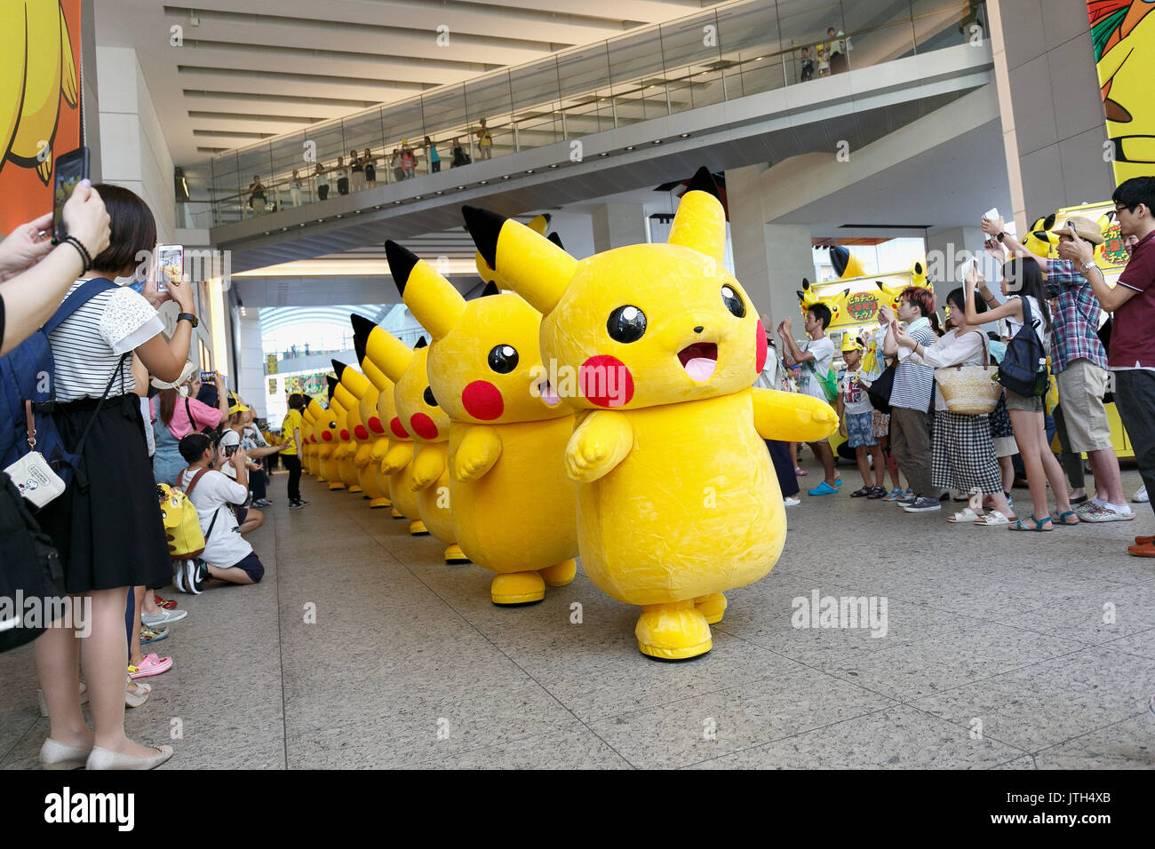 Yokohama, Japan. 9th August, 2017. Pikachu characters march at a ...